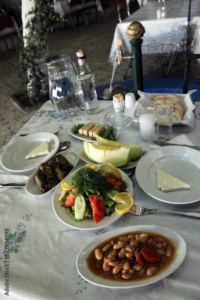 Traditional Turkish appetizer foods (Turkish meze) with raki on the ...