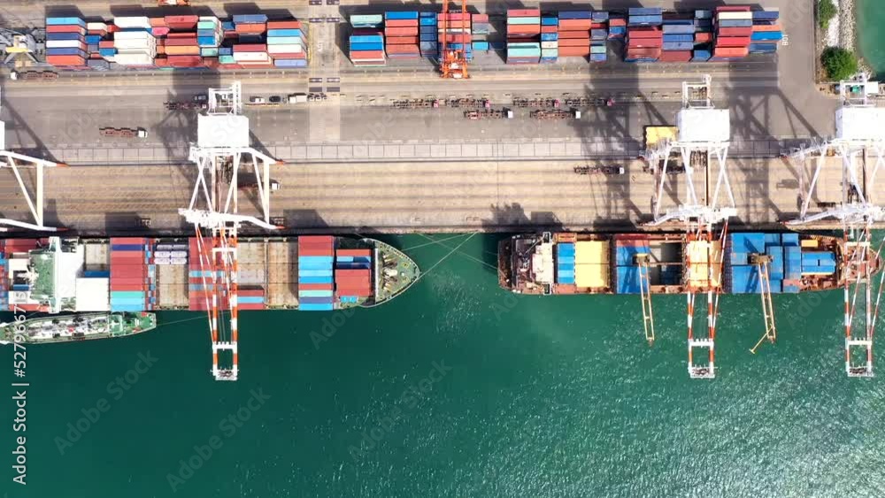 Container ship loading and unloading at commercial port, business ...
