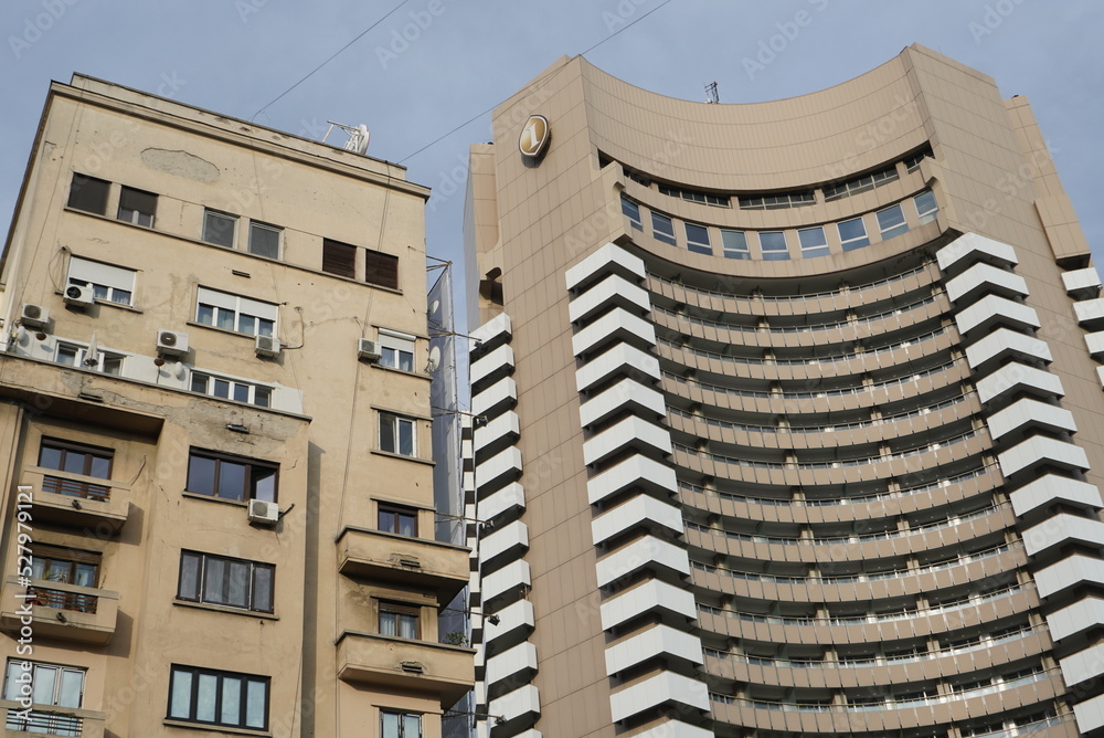 Old block of flats and hotel towers in Bucharest. Urban architecture ...