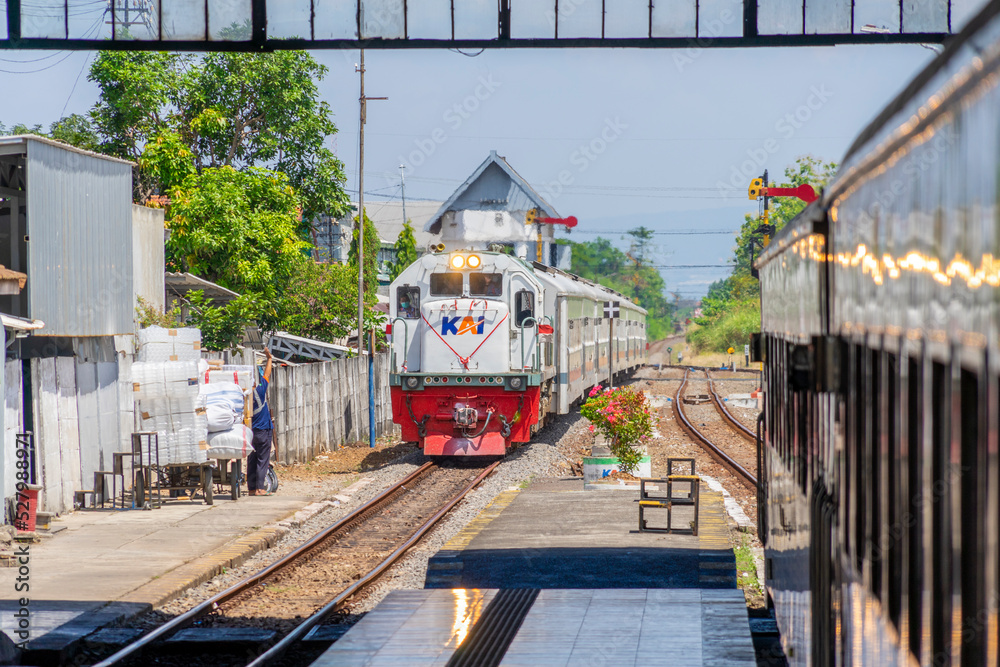 Passenger train locomotive of PT Kereta Api Indonesia (KAI) a ...