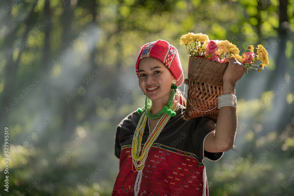 Beautiful Asian young tribal lady in the native traditional dress ...