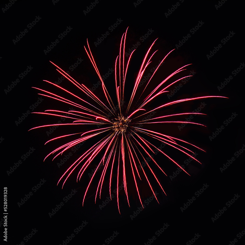 Red fireworks light up the night sky. Fireworks display on dark clean ...