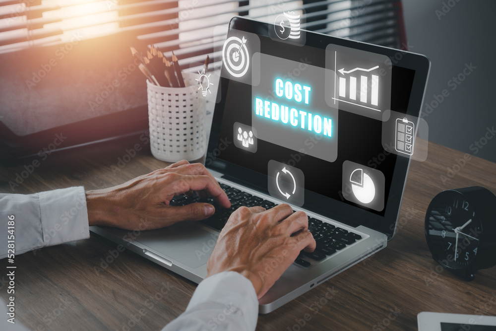 Cost reduction business finance concept, Businessman hand working on ...