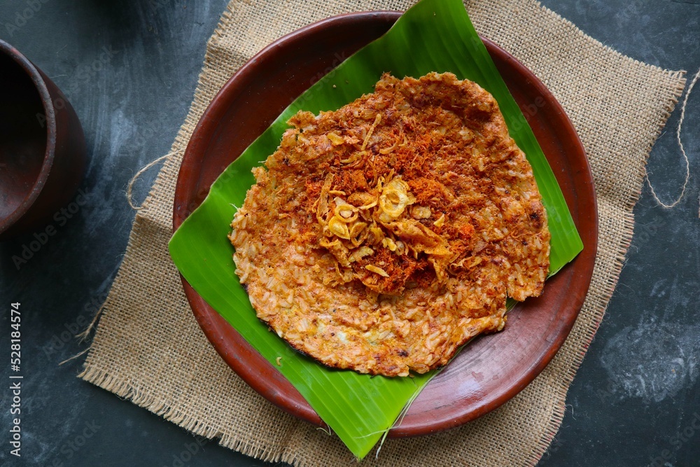 kerak telor or Egg Crust. kerak telor is Spicy Glutinous Rice Omelette ...