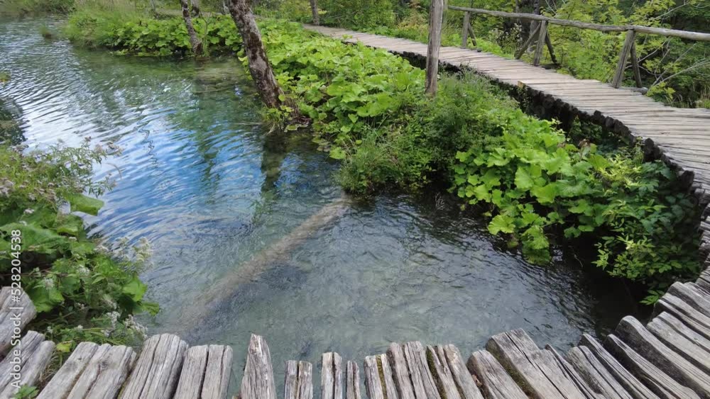 circular wooden jetty bridge of Milino Jezero leke of the National Park ...
