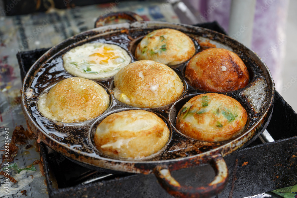 The process of making quail egg mini martabak. one of the street food ...
