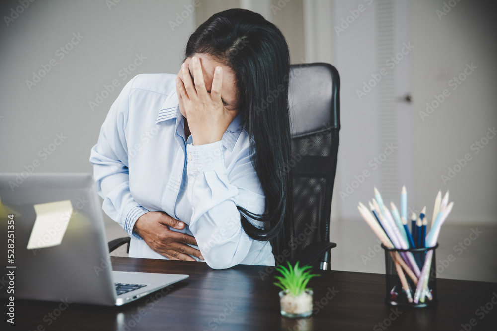 Young asian business woman person sitting at work and has stress pain ...