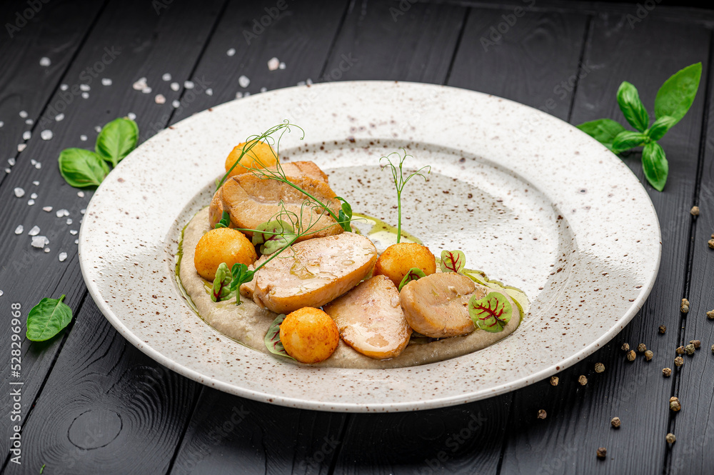 Fried bull testicles with potatoes and mushroom sauce. Stock Photo ...