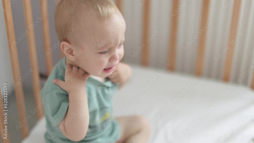 crying baby in bed crib with wooden bars, screaming toddler infant ...