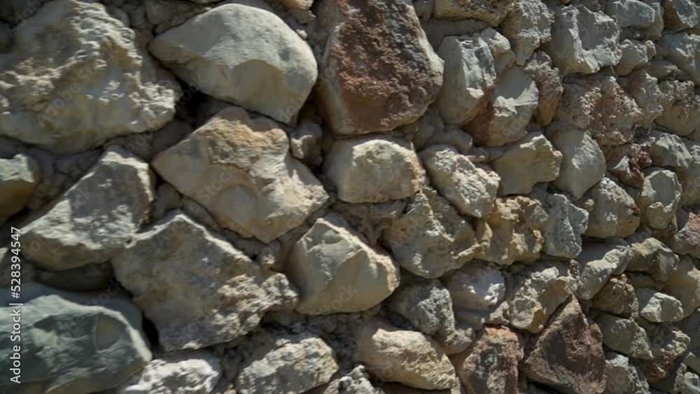 Right dolly slide, facade constructed of rough, uncut stones, concrete ...
