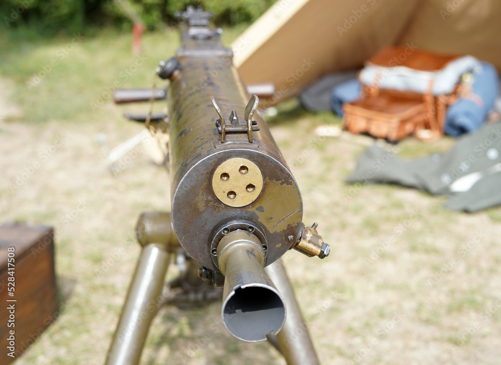 Detail of a historical gun barrel. It is a machine gun that has a round ...