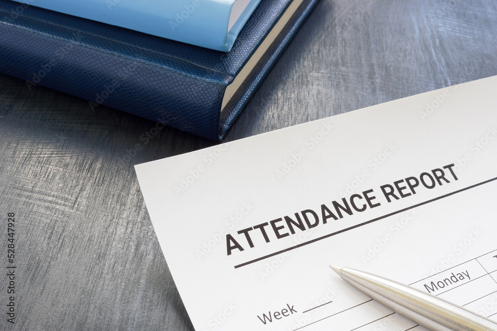 Attendance report form and pen near notepad. Stock Photo | Adobe Stock