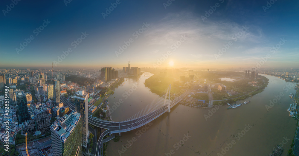 Aerial view of Ho Chi Minh City skyline and skyscrapers on Saigon river ...