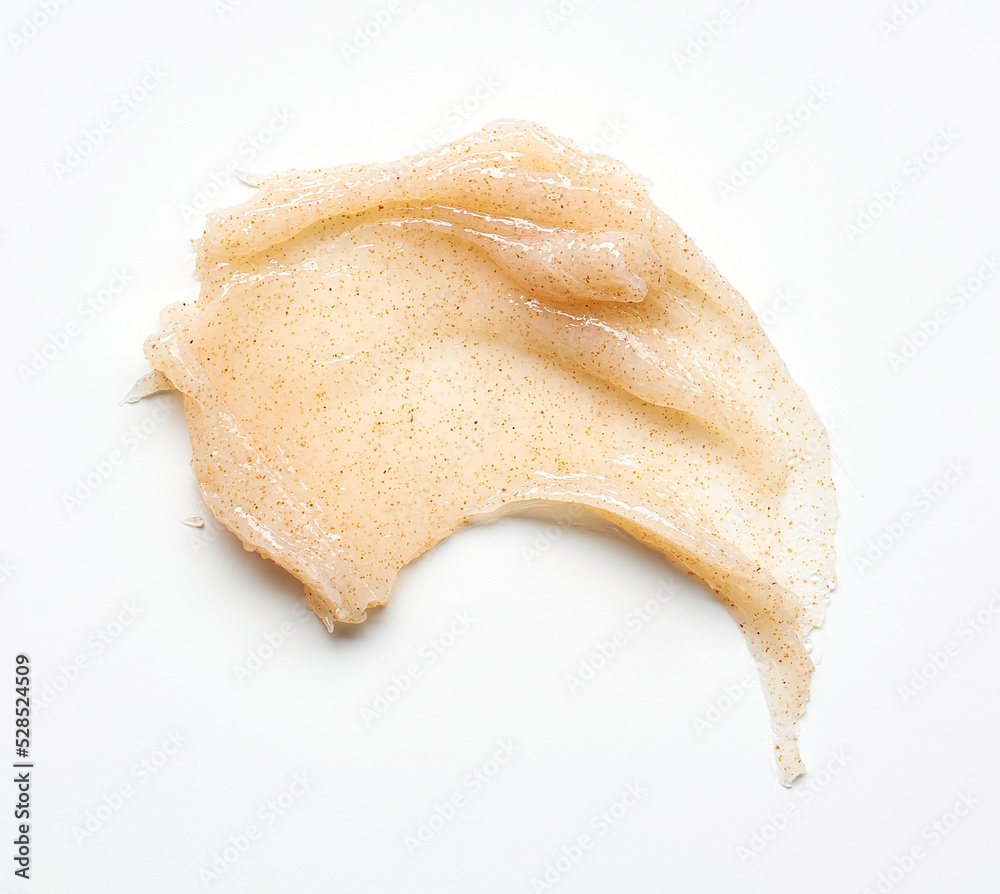 Light beige smear of creamy body scrub isolated on white background ...