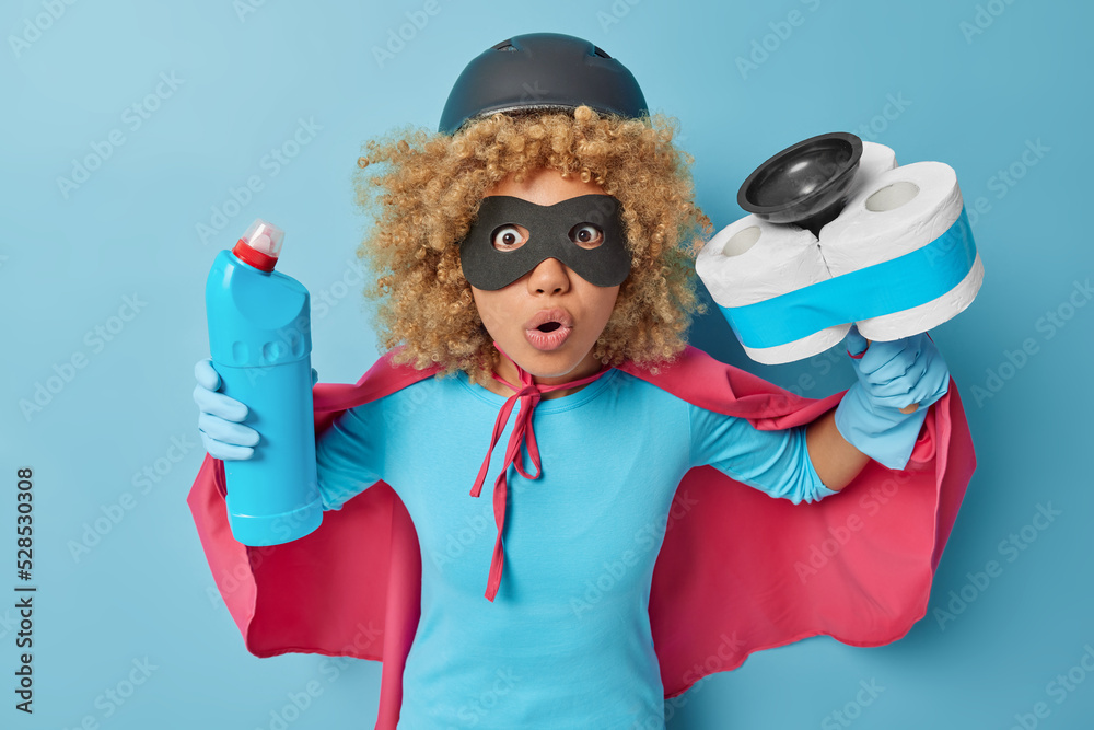 Scared woman pretends being superhero ready for cleaning house does ...