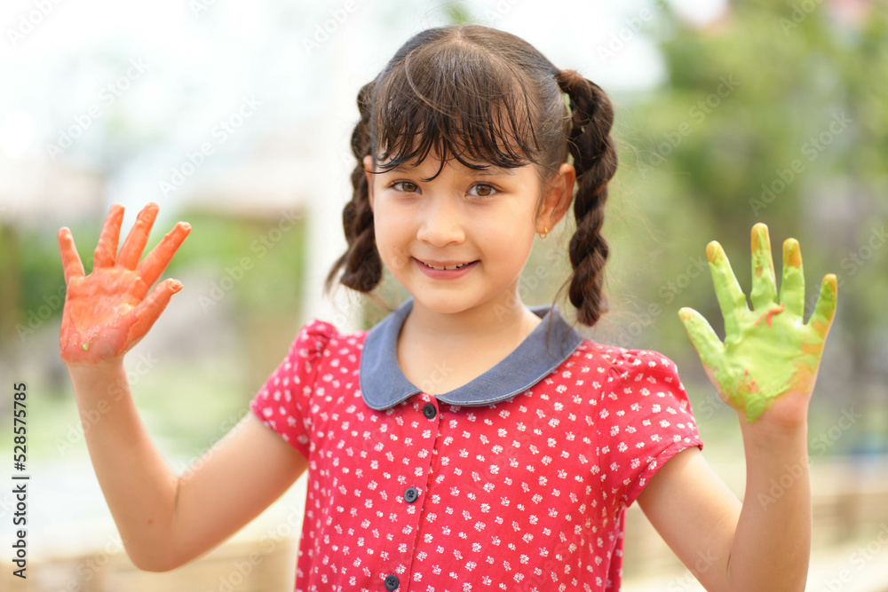 Children's drawing workshop, happy children make handprints with paint ...