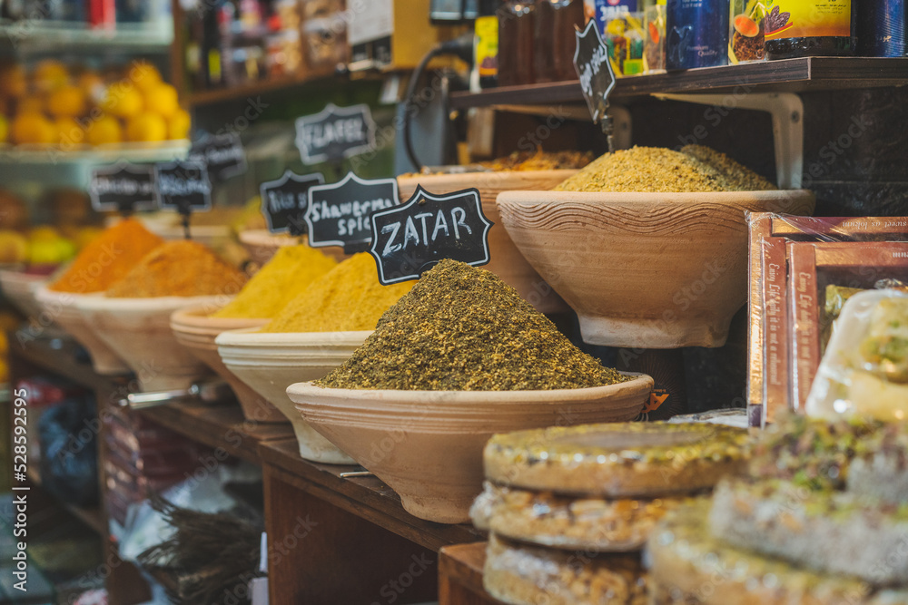Spices display in a street market fresh colorful spices piles with ...