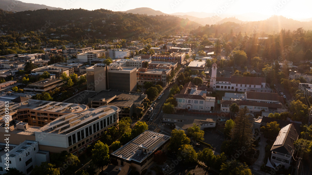 Sunset light shines on the historic Spanish Colonial mission and ...