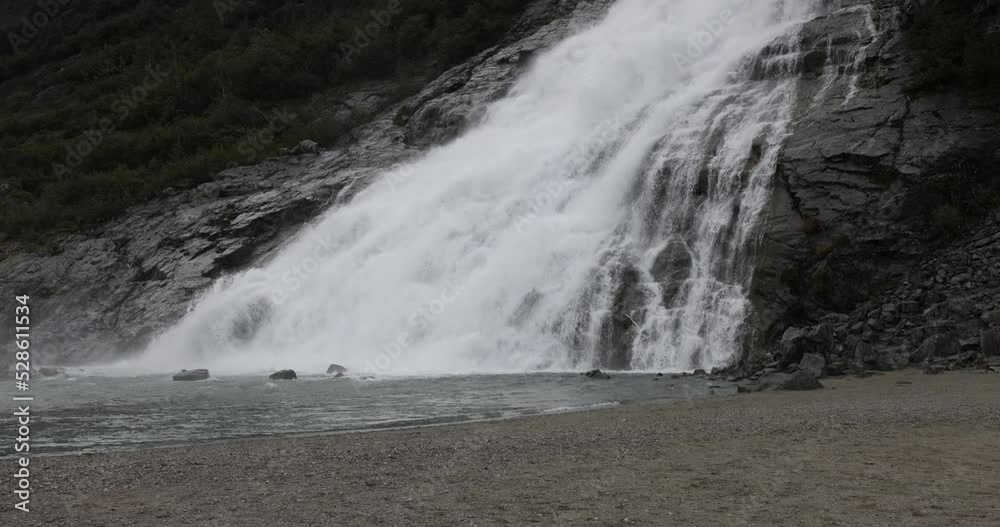 Nugget Falls cascade Mendenhall Glacier Alaska close. Waterfall glacial ...