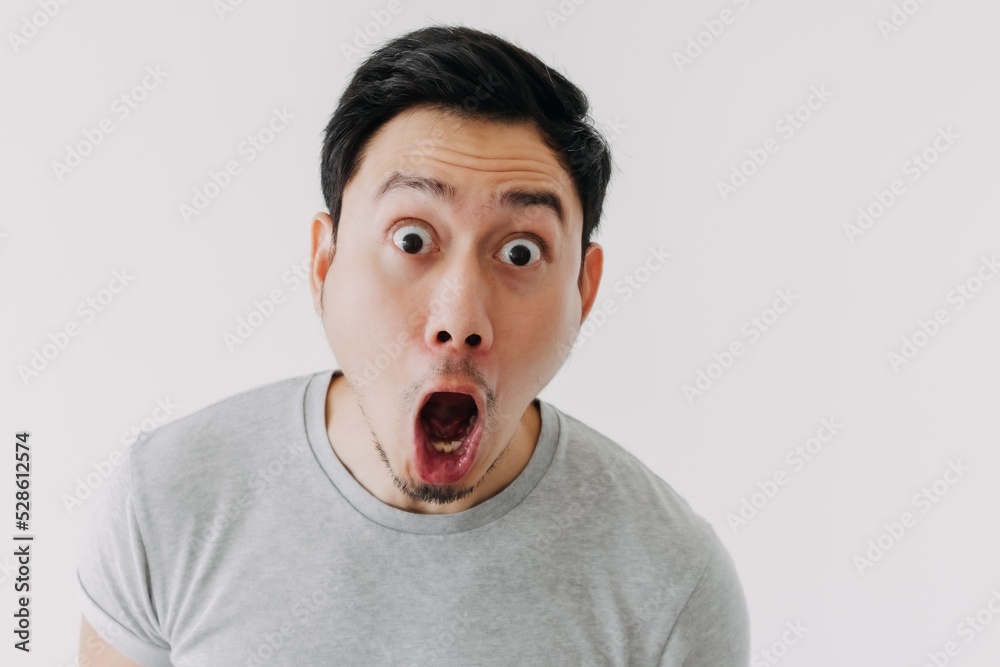 Funny shocked surprised closeup asian face man isolated on white ...