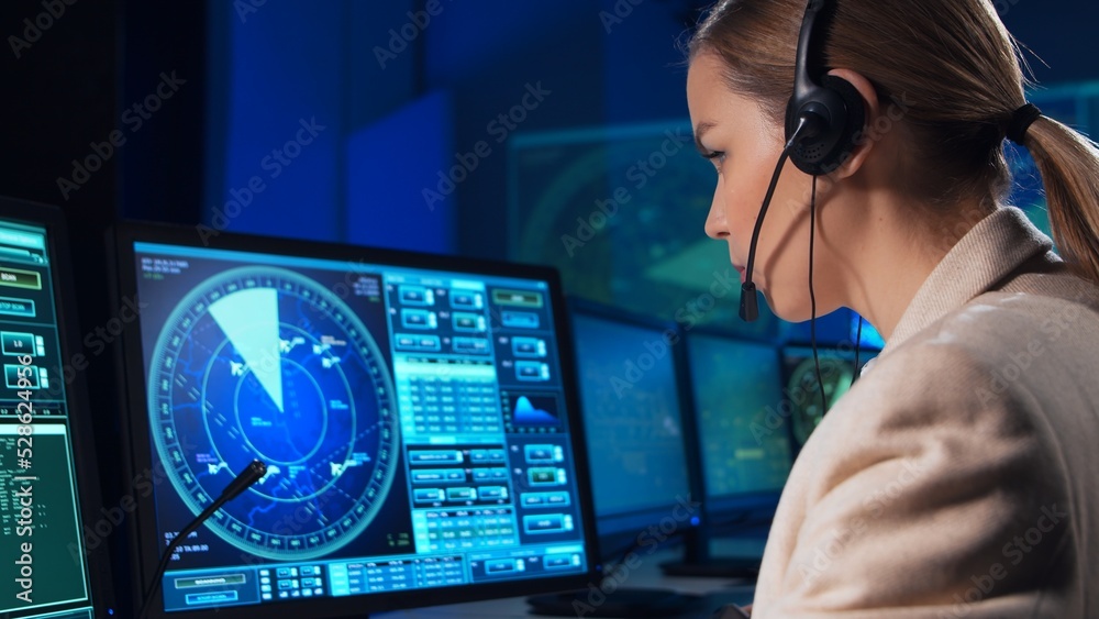 Workplace of the air traffic controllers in the control tower. Team of ...