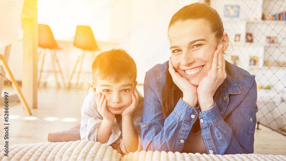 Mother and son happy together in the living room Stock Photo | Adobe Stock