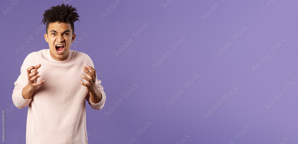 Portrait of hateful, outraged young hispanic man losing his temper ...