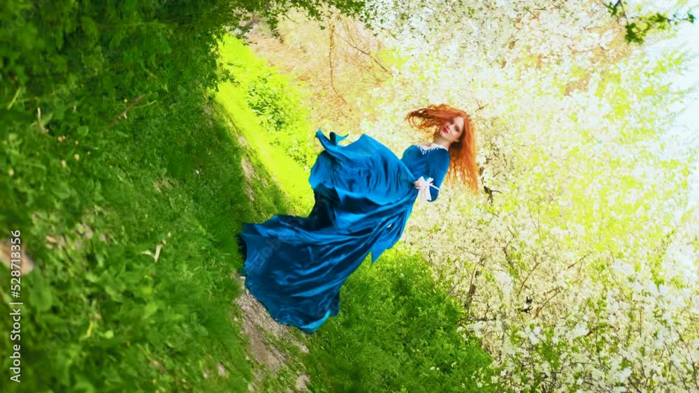 Fantasy active Happy redhead woman running in summer forest. Princess ...