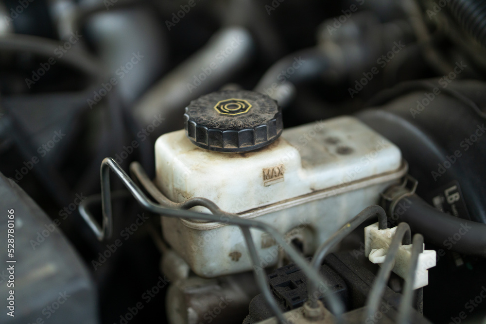 brake fluid reservoir. under the hood of the car. garage. Stock Photo ...