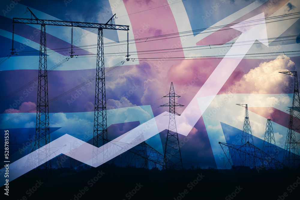 Rising up arrow against UK flag and power line silhouette and stormy ...