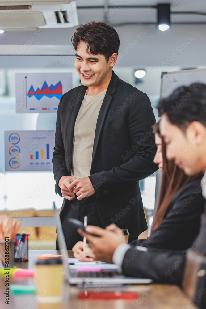 Asian handsome professional successful businessman presenter standing ...