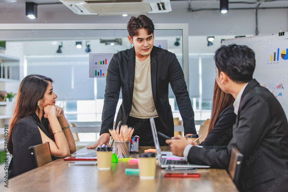 Asian handsome professional successful businessman presenter standing ...