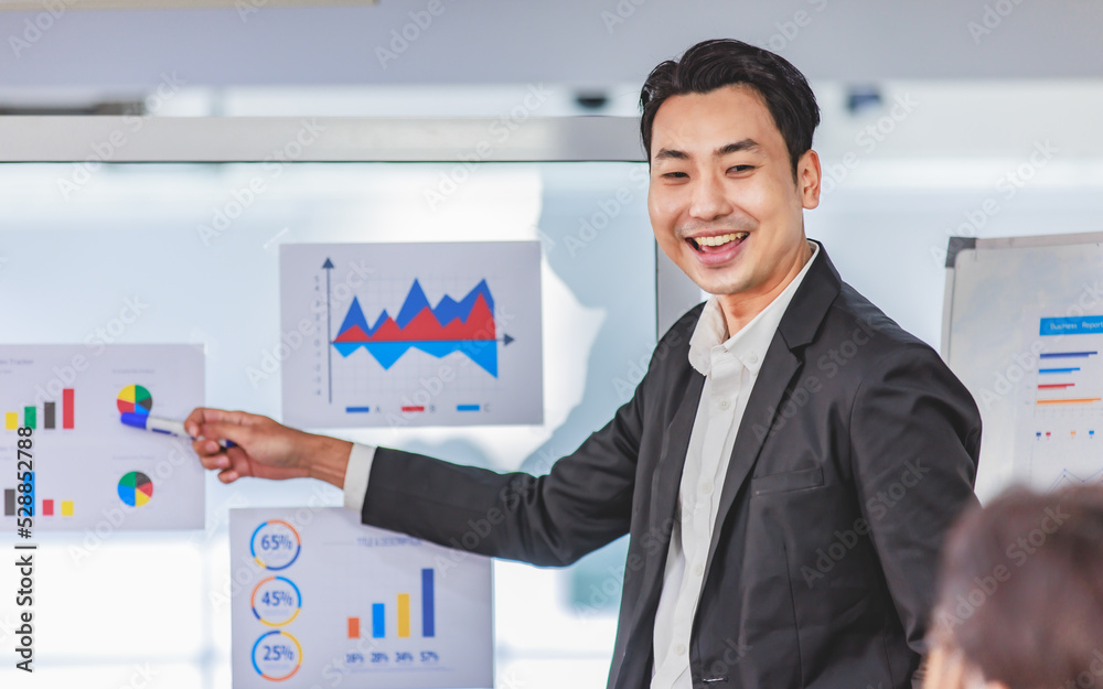 Foto de Asian handsome professional successful businessman presenter ...