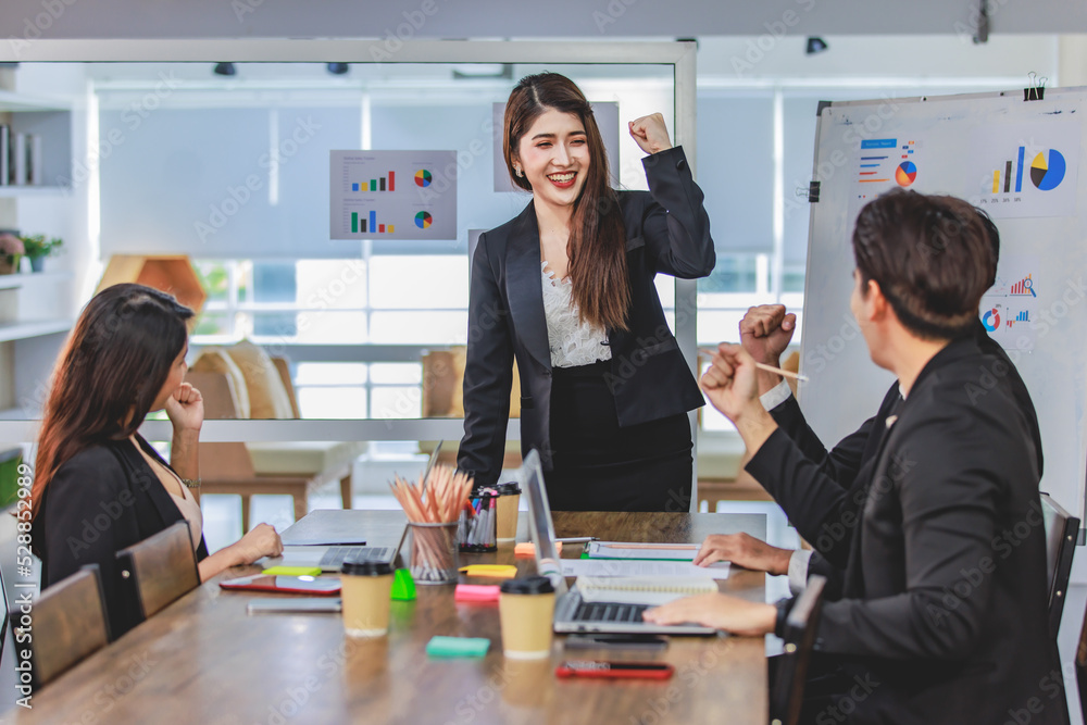 Asian young beautiful professional successful businesswoman presenter ...