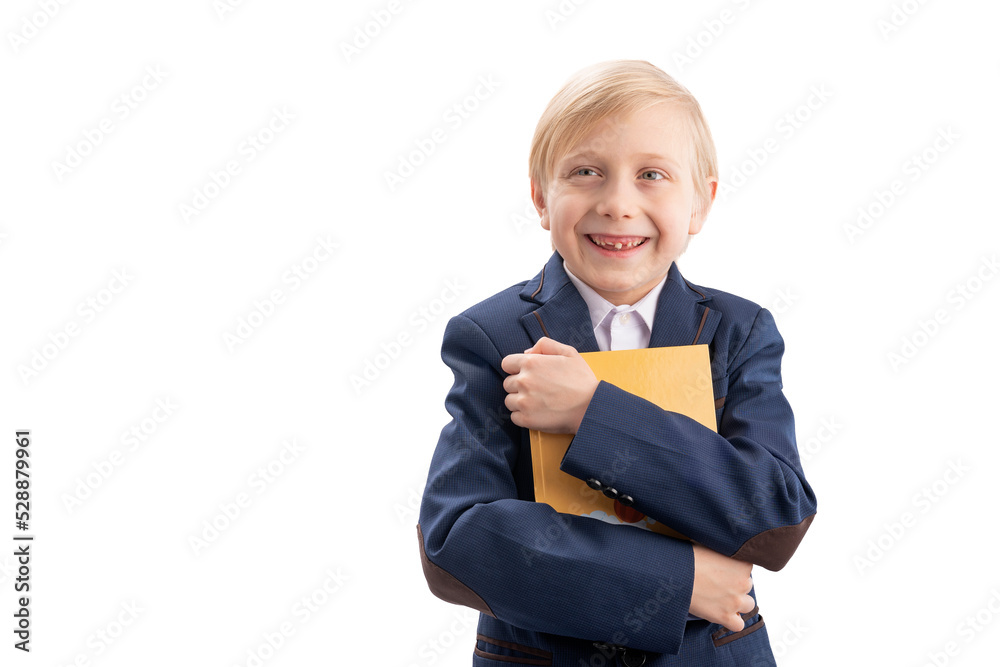 Smiling first-grader in school uniform hugs a book. Portrait of happy ...