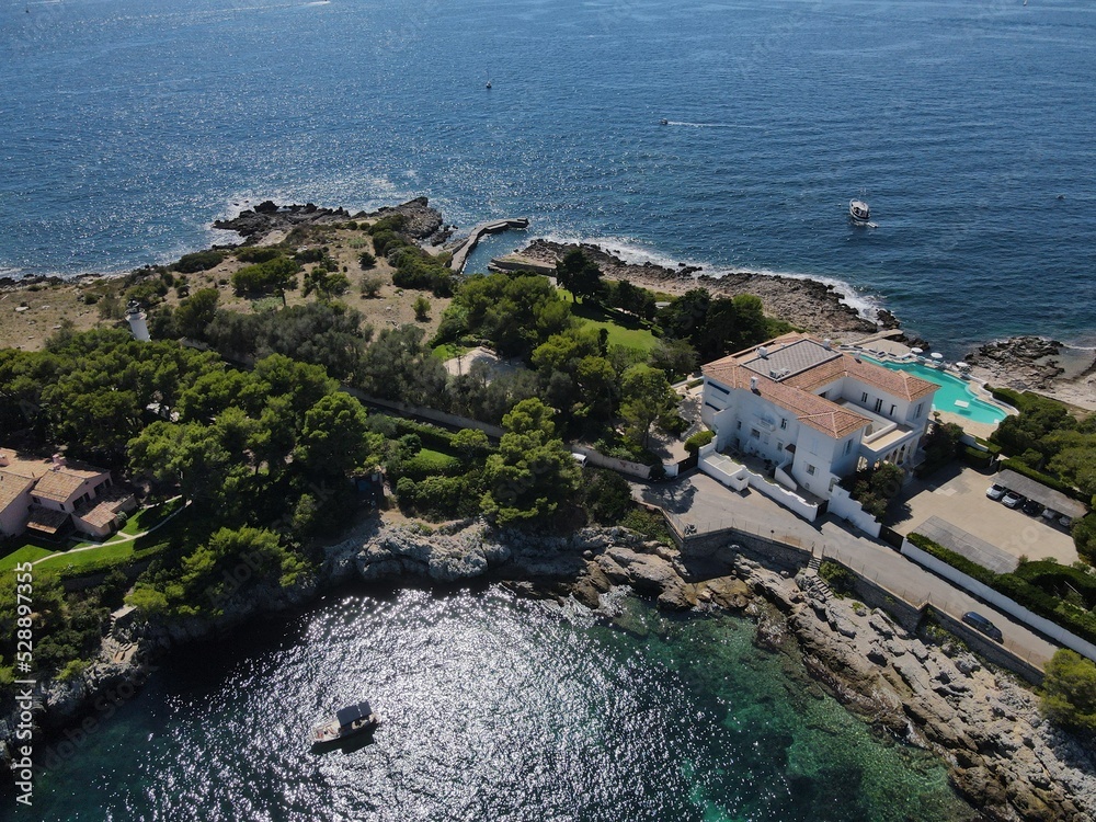 Aerial view of Cap d'Antibes and Billionaire's Bay. Beautiful rocky ...
