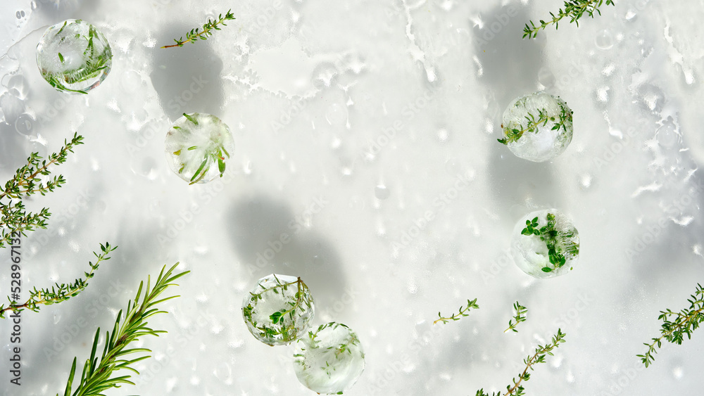 Wet off white water background with melting balls of ice with frozen ...