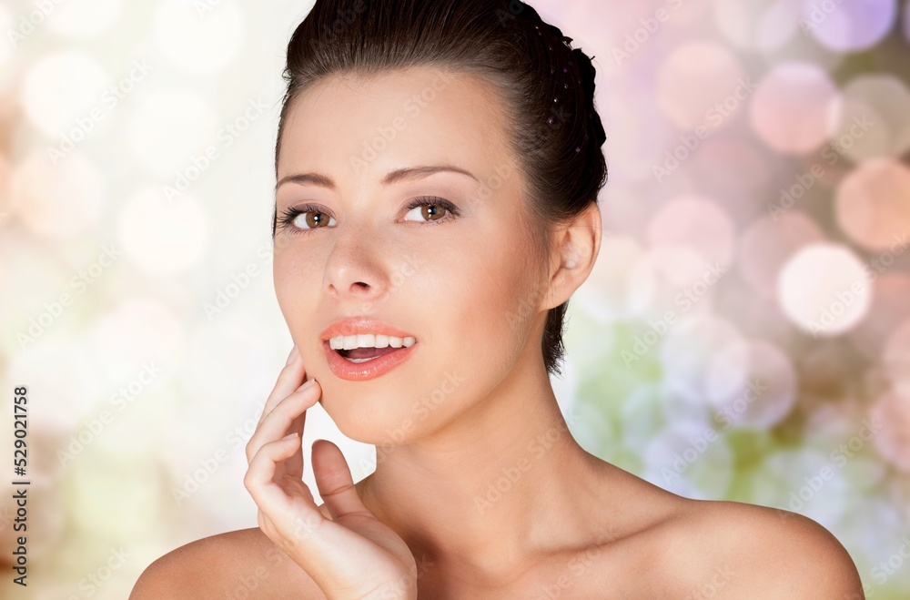 Beautiful young woman model with perfect clean fresh skin. Face care ...