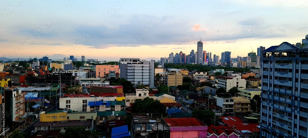 Panoramic view of Quezon City in the Philippines in the evening with ...