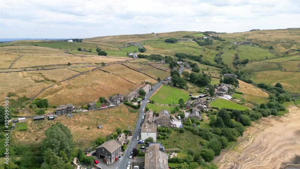 Aerial footage of a rural industrial Yorkshire town village with old ...