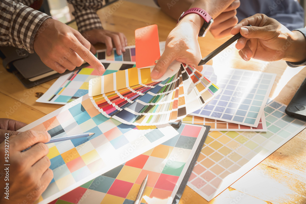 Interior designer chooses a color chart for home design. Graphic ...