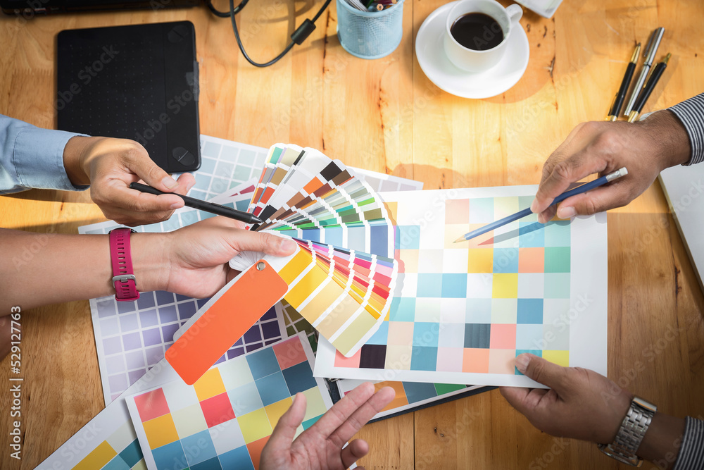 Interior designer chooses a color chart for home design. Graphic ...