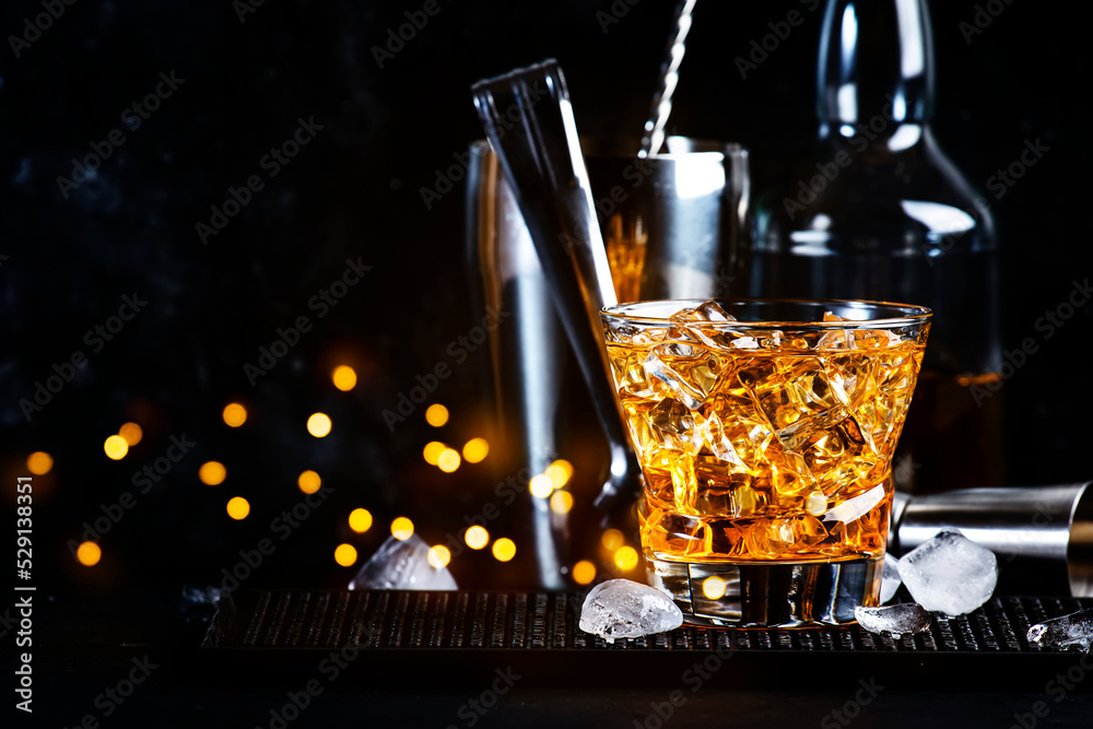 Godfather cocktail with scotch whiskey, almond amaretto liqueur and ice ...