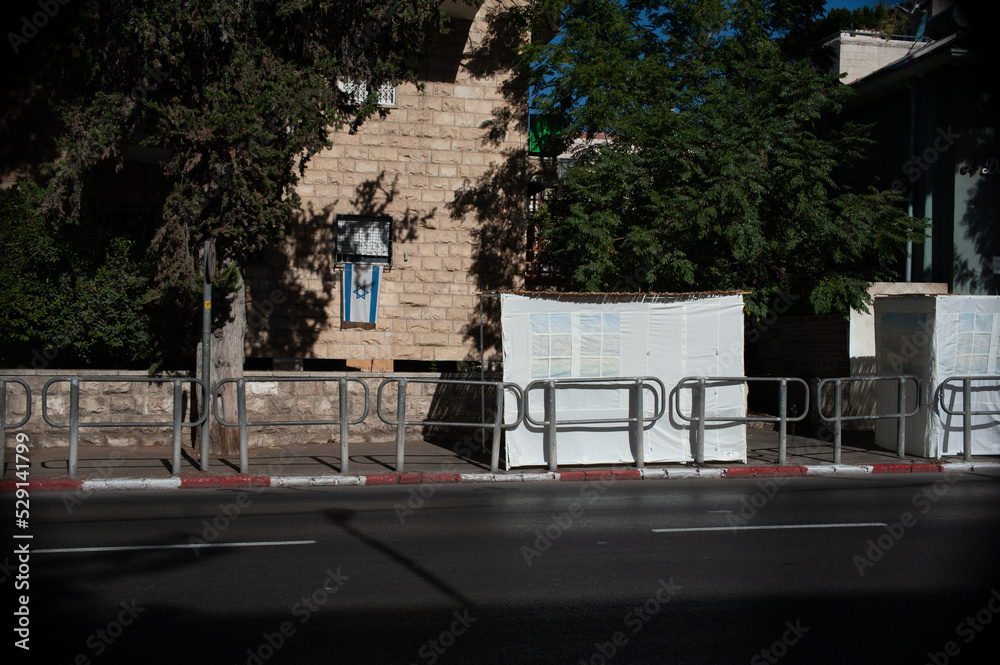 During the Jewish holiday of Sukkot, Jews construct a sukkah, which ...