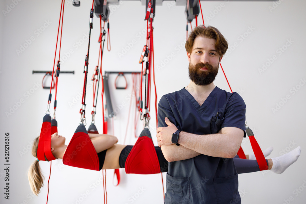 Portrait of a male physiotherapist doctor against the background of a ...