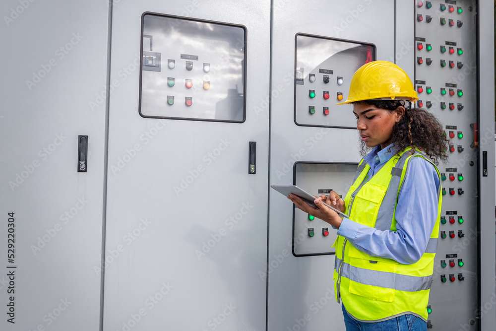 The engineer checking and inspecting at MDB panel .he working with ...