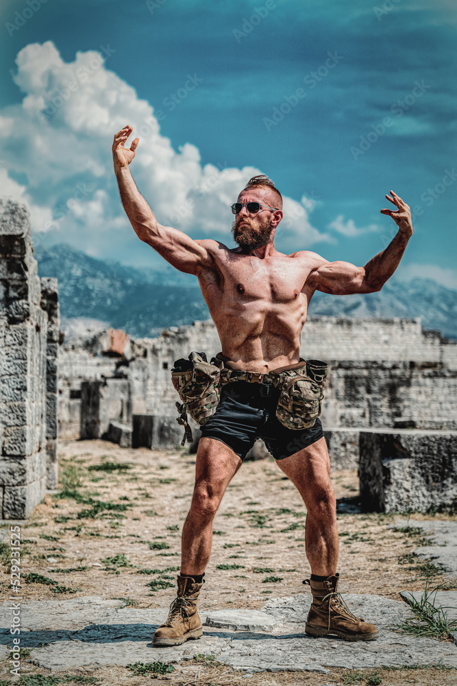 Muscular Man Striking a Pose on the ancient Roman site Stock 写真 | Adobe ...