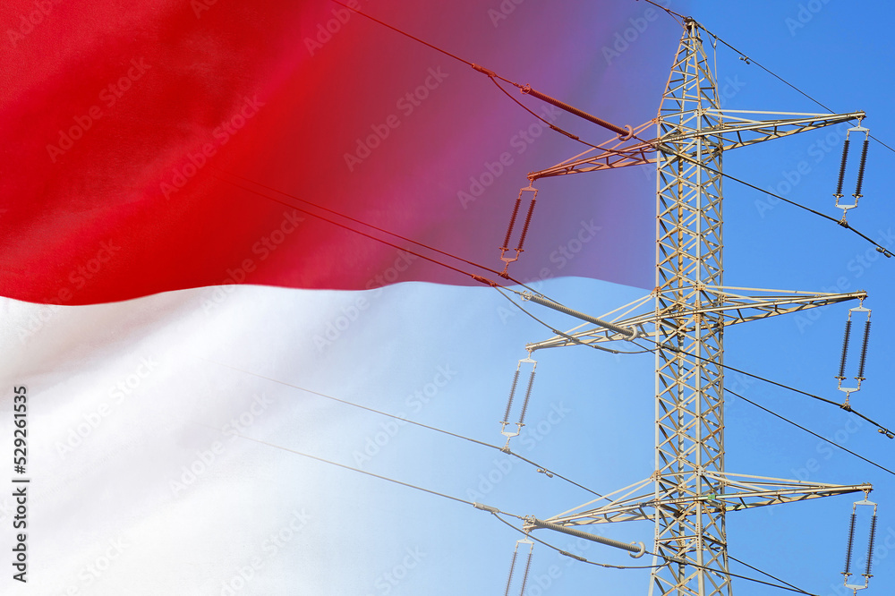 Indonesia flag on electric pole background. Power shortage and increased energy consumption in ...