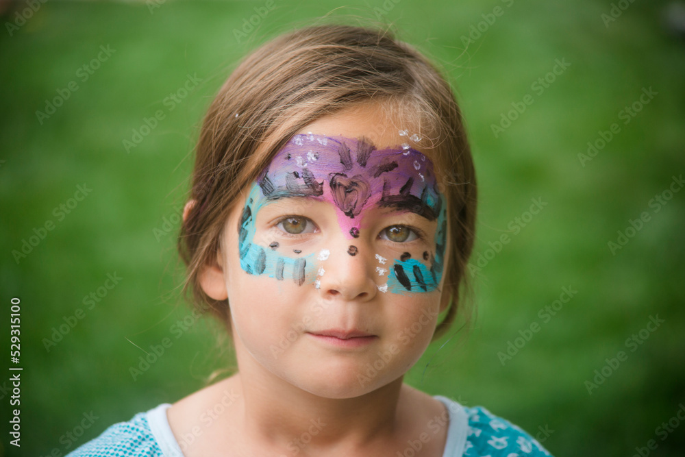 Portrait of cute girl with face paint during party Stock Photo | Adobe ...