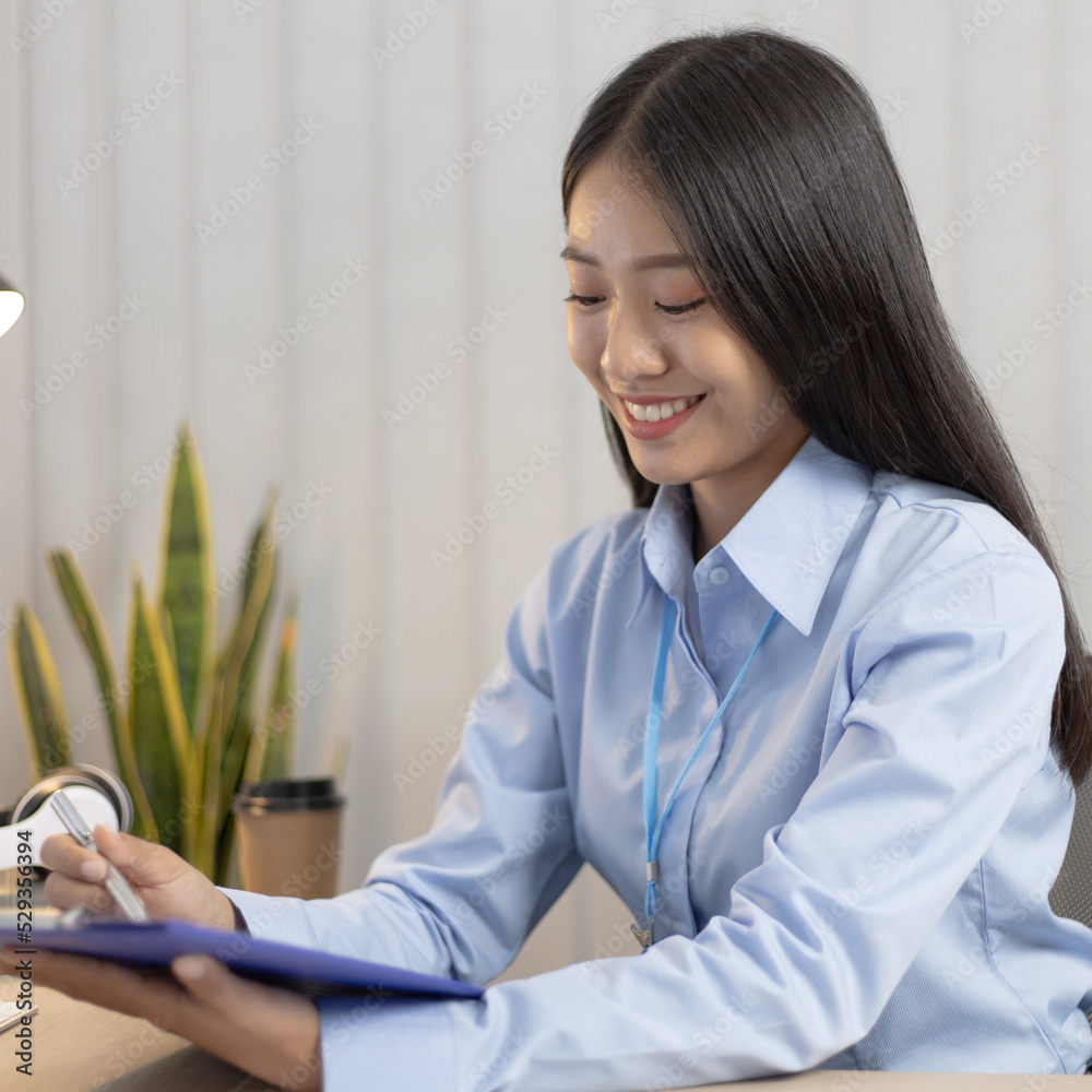 Happy business people,Asian female employee works in the company's ...